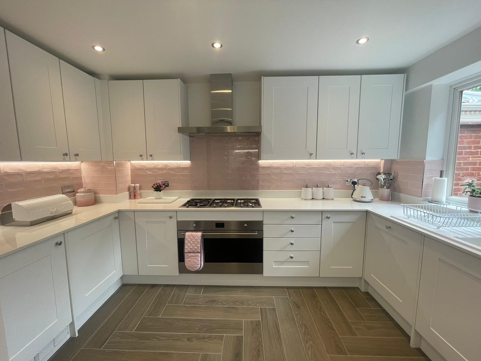 U-Shaped Shaker Kitchen Transformation with Pink Backsplash | Hugo Oliver